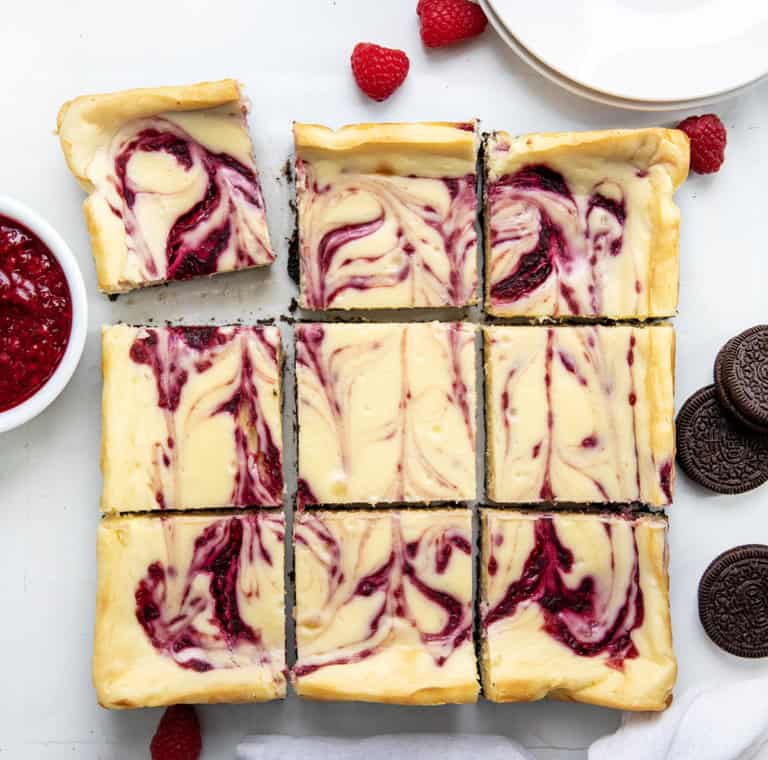 White Chocolate Raspberry Cheesecake Bars - i am baker
